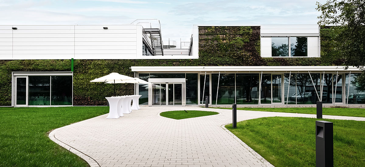 A vivid building envelope – Vertical facade greening on structural timber construction | EJOT COM